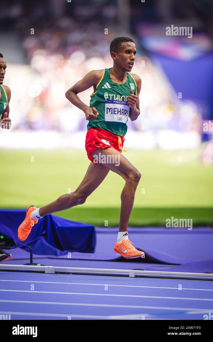 Biniam Mehary participating in the 5000 meters at the Paris 2024 ...
