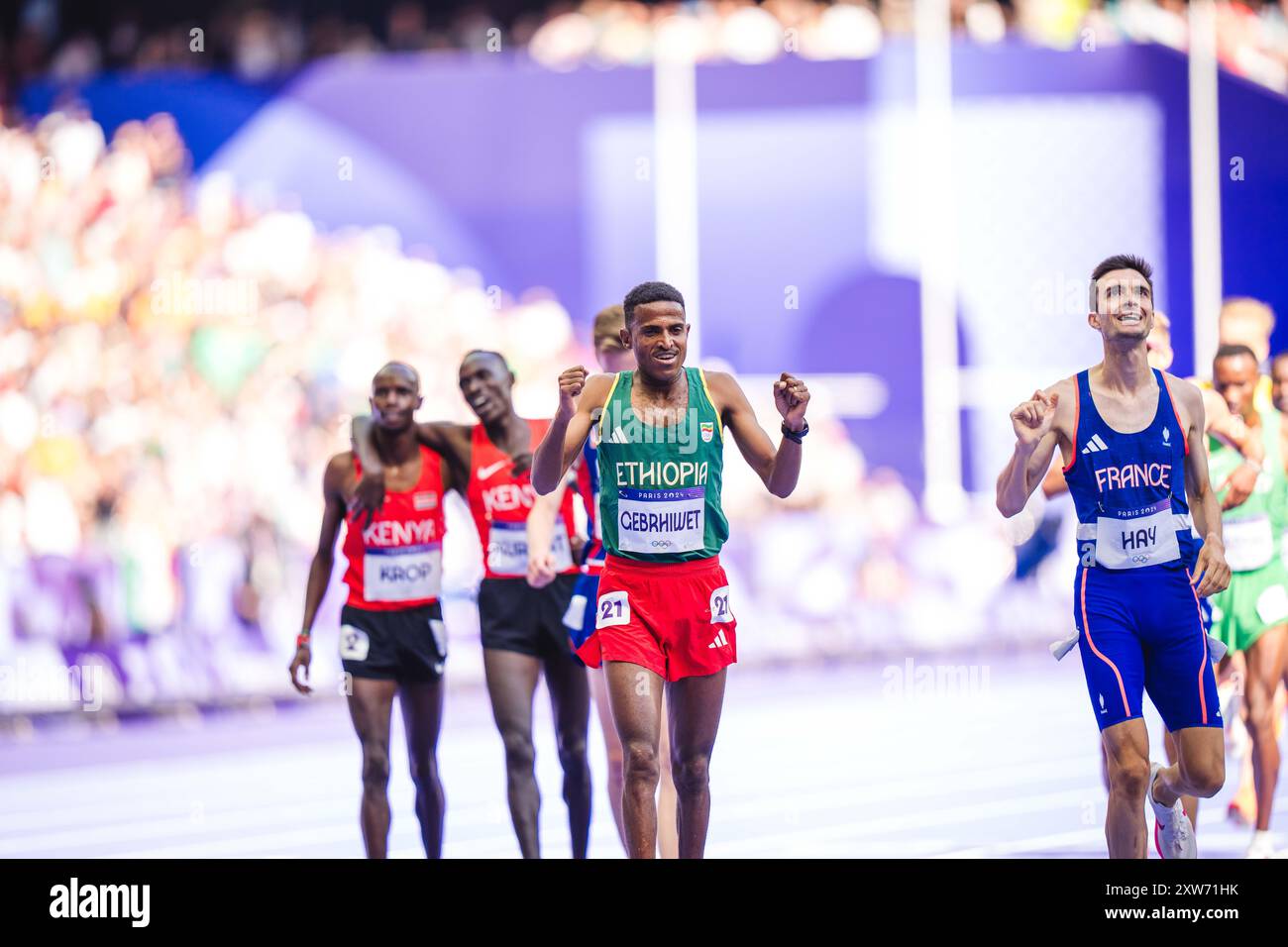 Hagos Gebrhiwet participating in the 5000 meters at the Paris 2024 ...