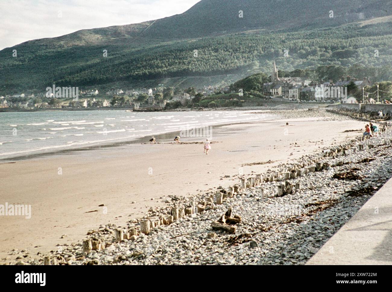 Sandy beach view to seaside resort town of Newcastle, County Down ...