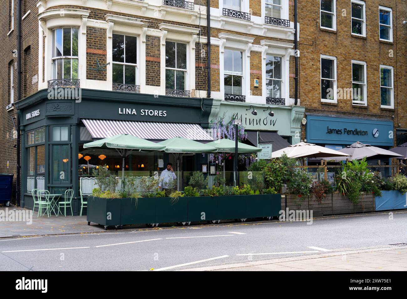 Shops and Restaurants on the Pavement in Clapham Old Town - London UK ...