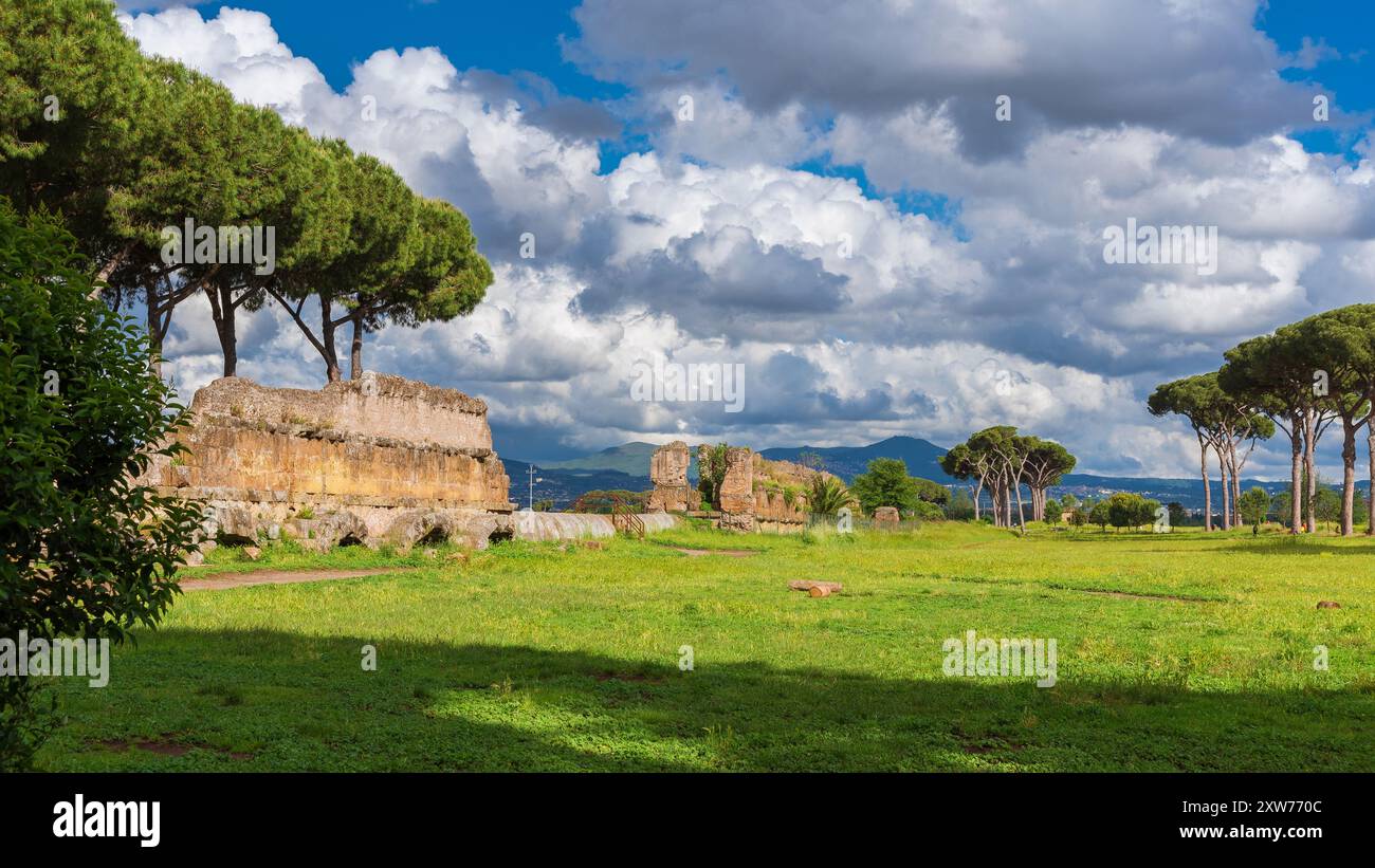 Ancient roman aqueduct ruins in Rome public park with beautiful clouds ...