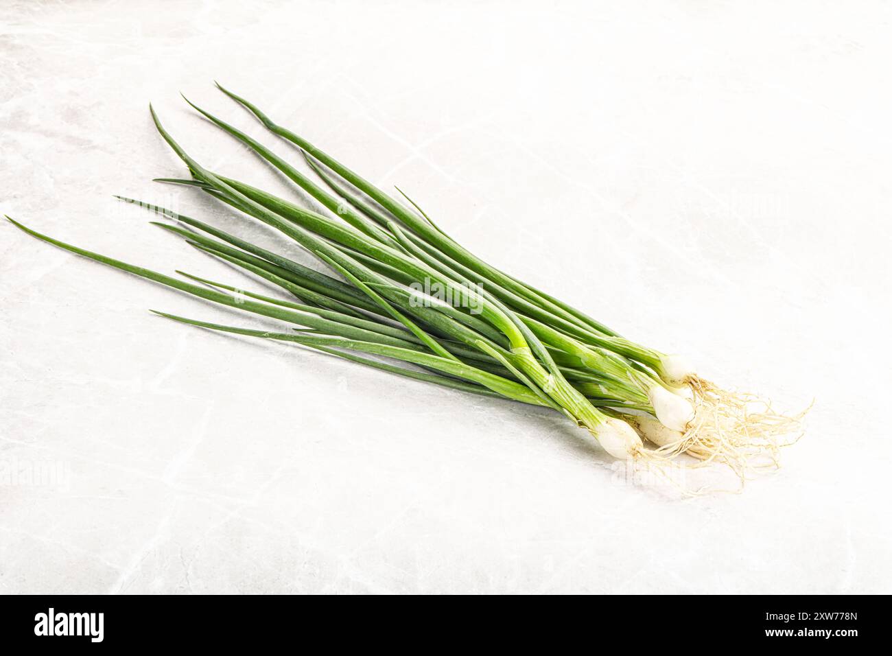 Young aroma fresh green onion heap Stock Photo - Alamy