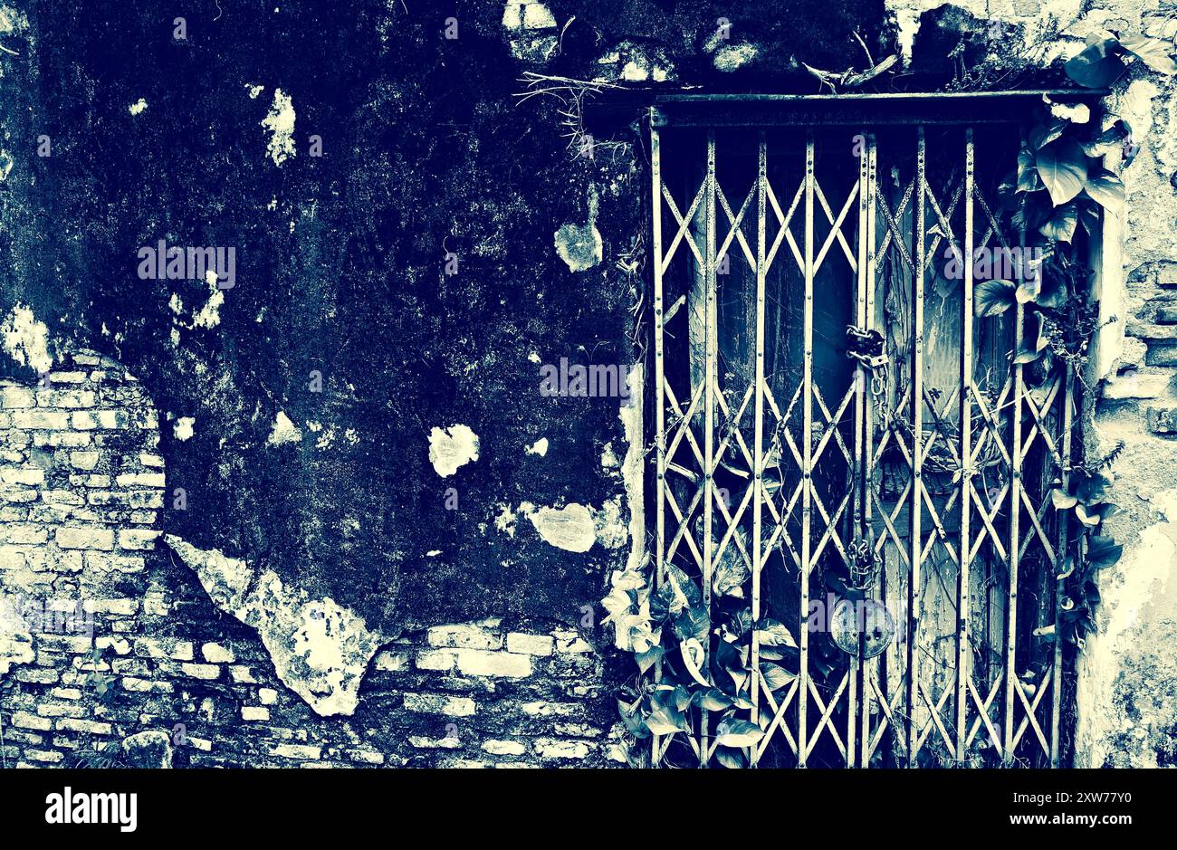 Dilapidated metal gate in lock and chain in Georgetown, Penang ...