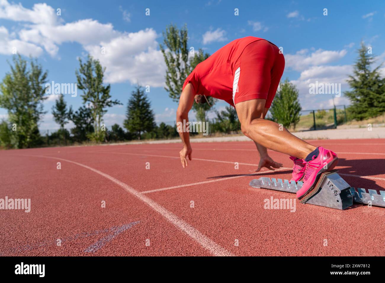 Stadium, man running and start block of athlete on a runner and arena ...
