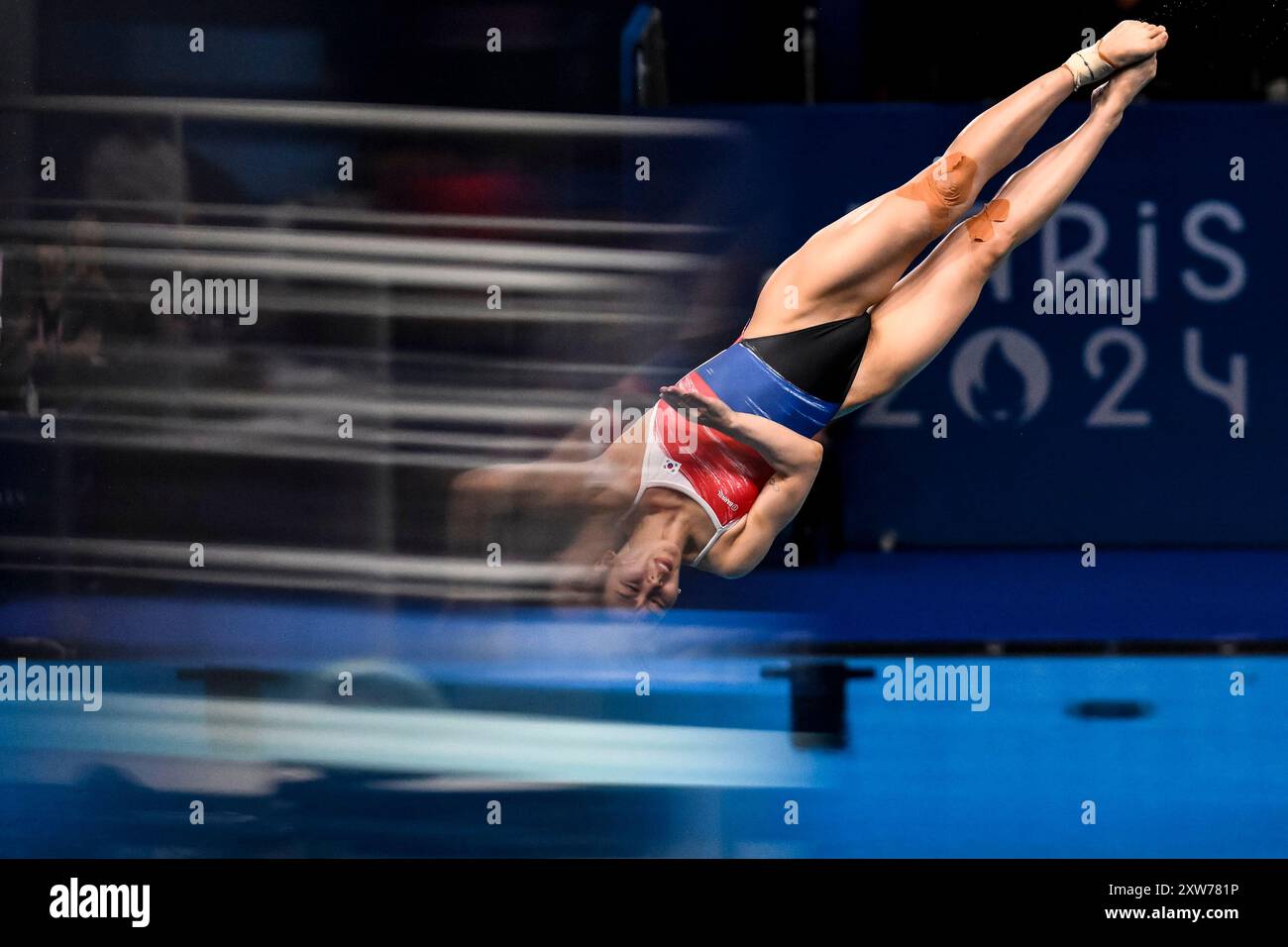 Suji Kim of South Korea competes in the diving 3m Springboard Women ...