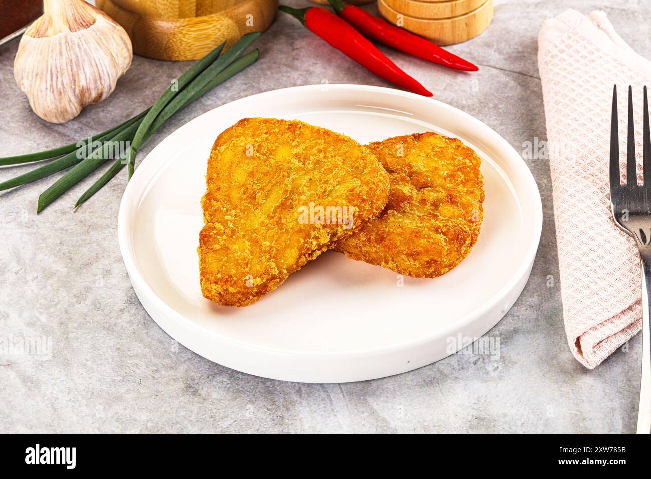 Fried potato hash brown snack for breakfast Stock Photo - Alamy