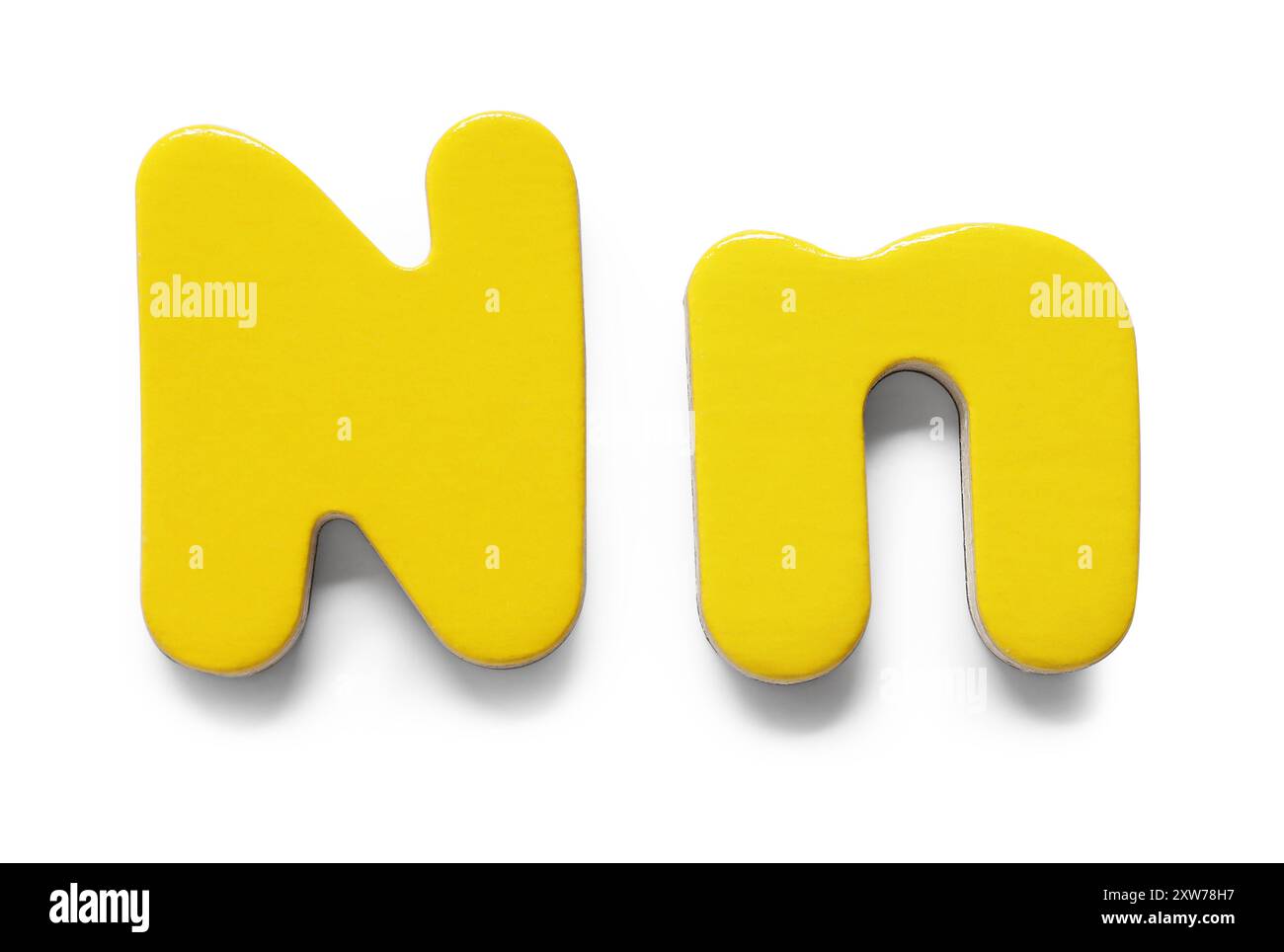 Uppercase and lowercase yellow magnetic letter N isolated white Stock ...