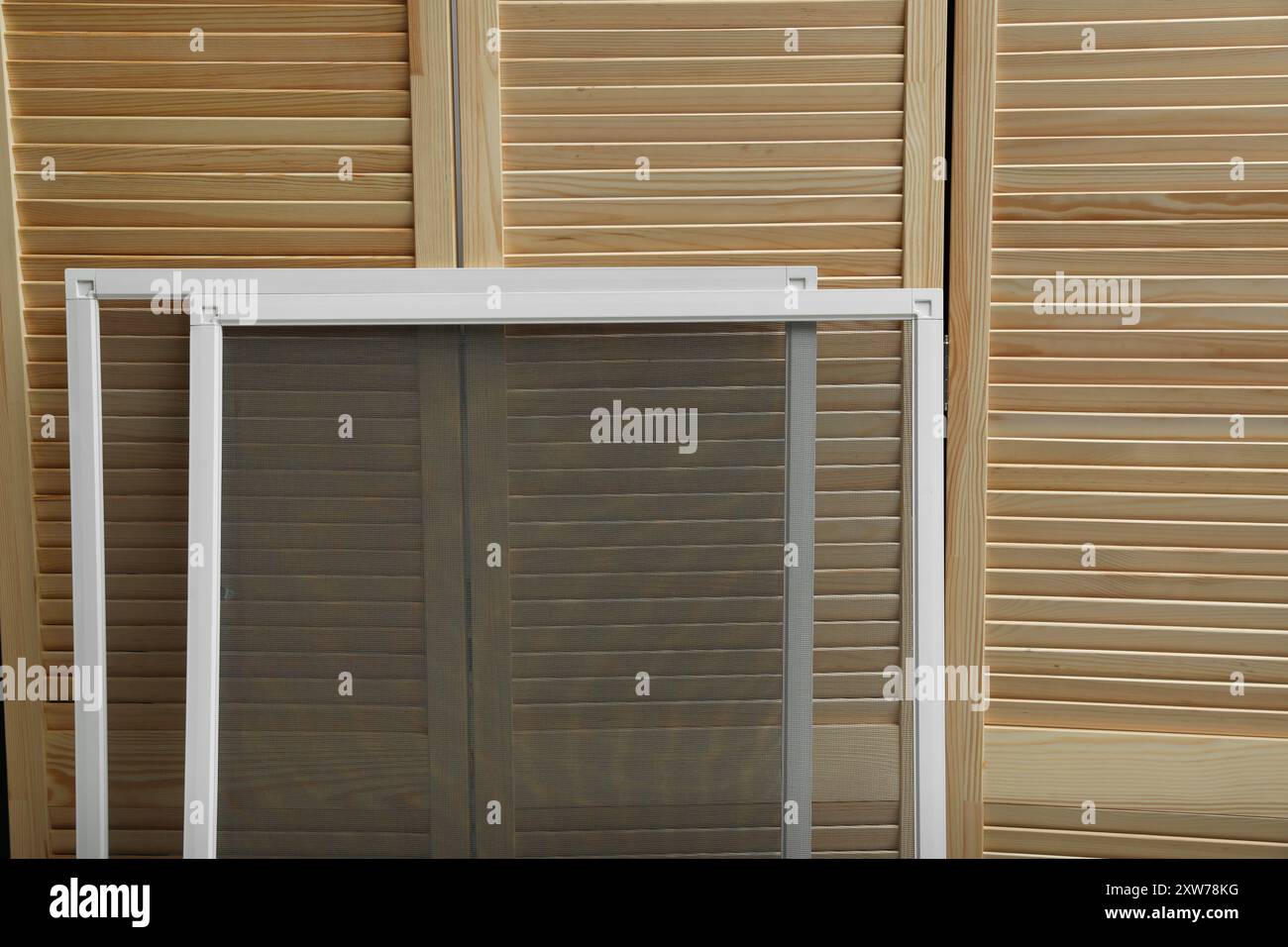 New window screens near wooden folding screen Stock Photo - Alamy