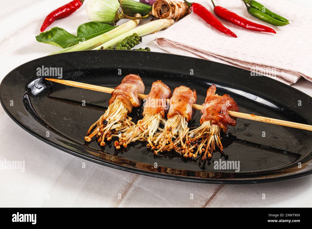 Thai Street foof satay with bacon and mushroom enoki skewer Stock Photo ...