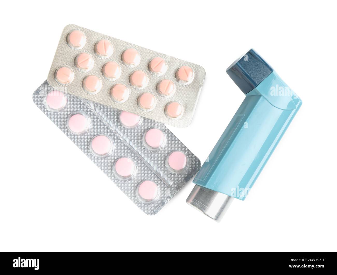 Asthma treatment. Inhaler and pills isolated on white, top view Stock ...