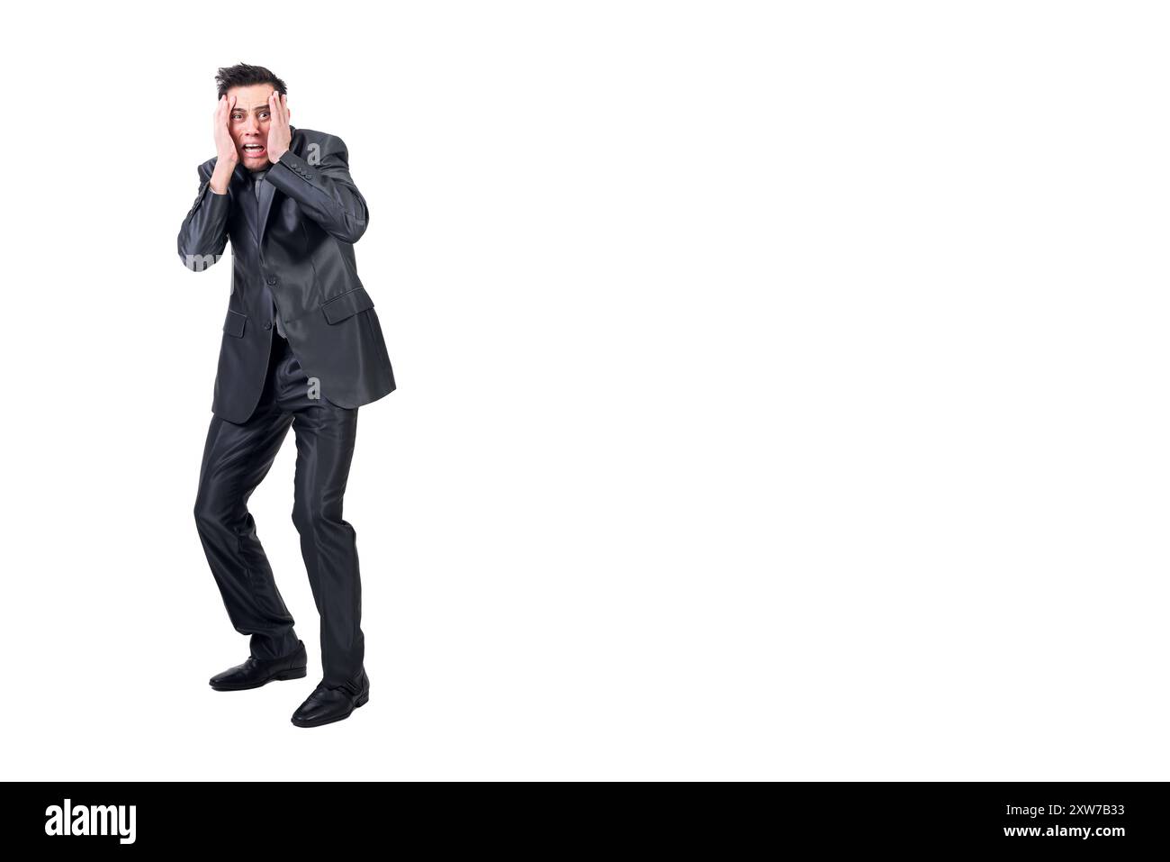 Fearful man in formal suit. White background Stock Photo - Alamy