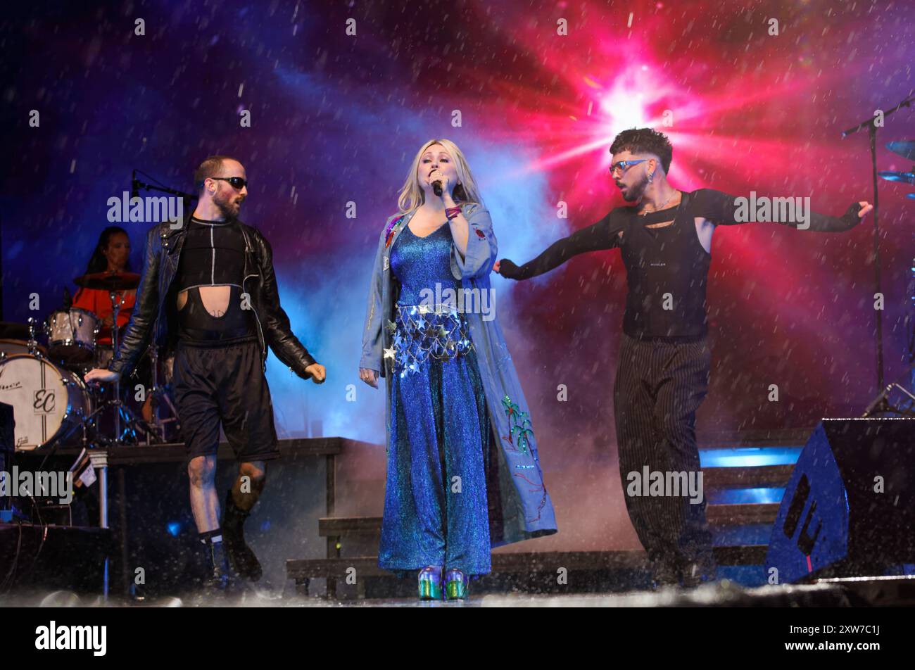 Despite the rain Mitsou performs on the main stage of Olympic park's ...