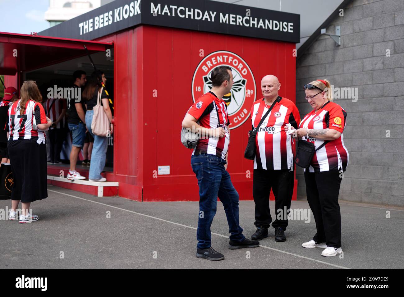 Brentford fans arrive at the ground ahead of the Premier League match ...