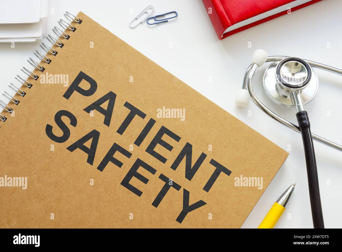 Patient safety book and stethoscope. Healthcare and medical care ...