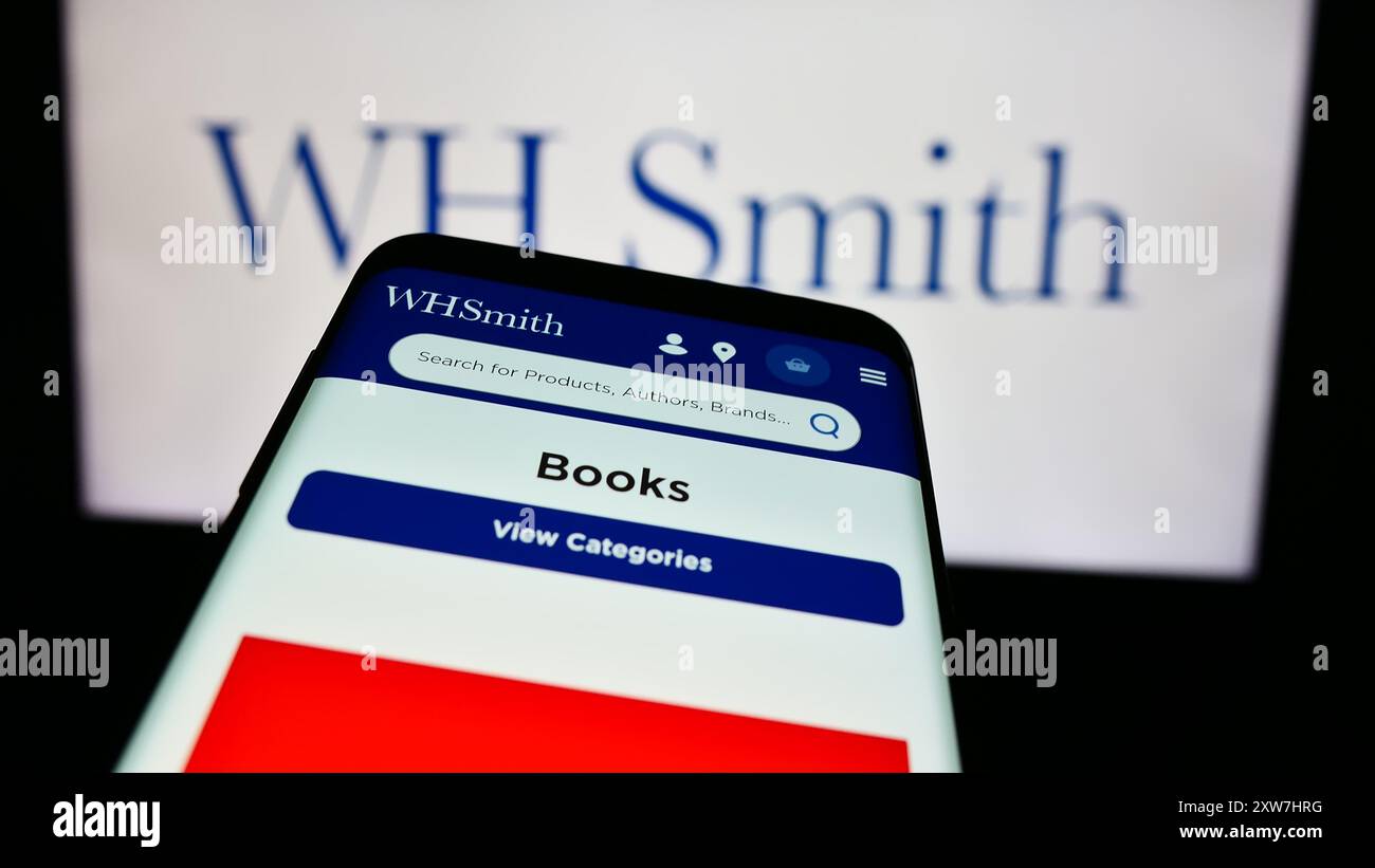 Mobile phone with website of British retail company WH Smith plc ...