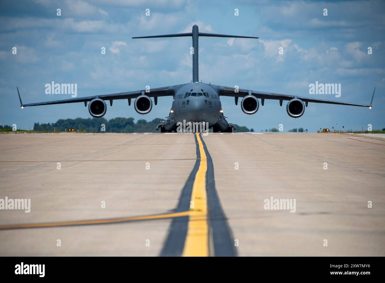 A C-17 aircraft from the 911th Airlift Wing taxis onto the flight line ...