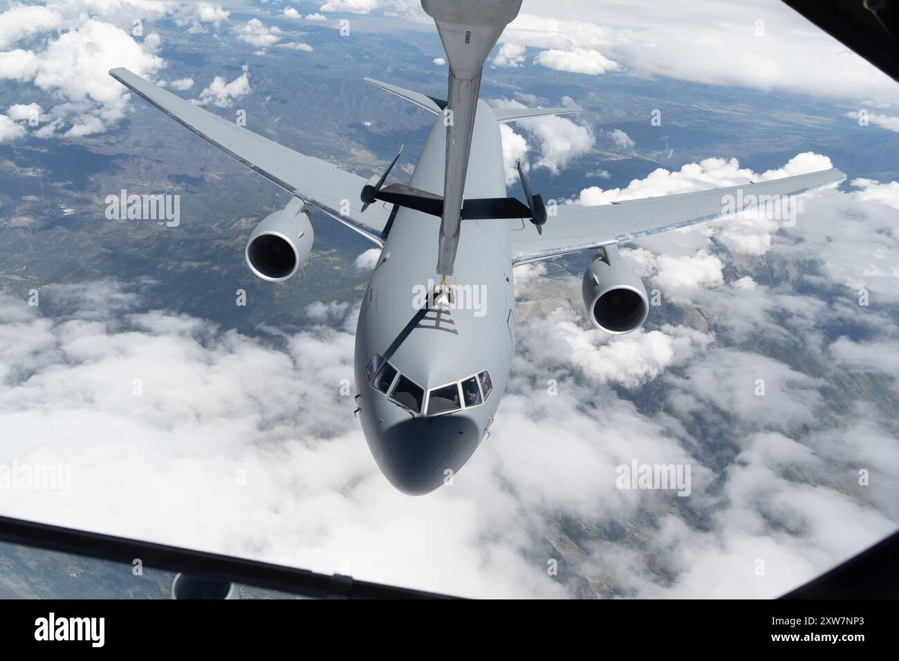 A U.S. Air Force KC-46A Pegasus simulates receiving fuel from a KC-10 ...