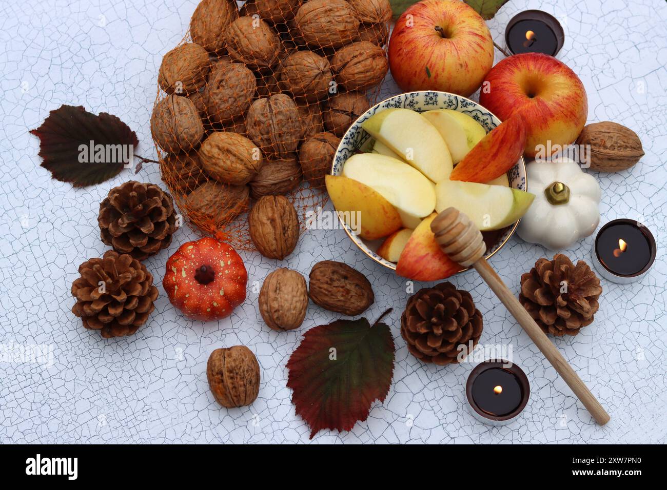 Rosh Hashanah symbols top view photo. Red apples, honey, decorations ...