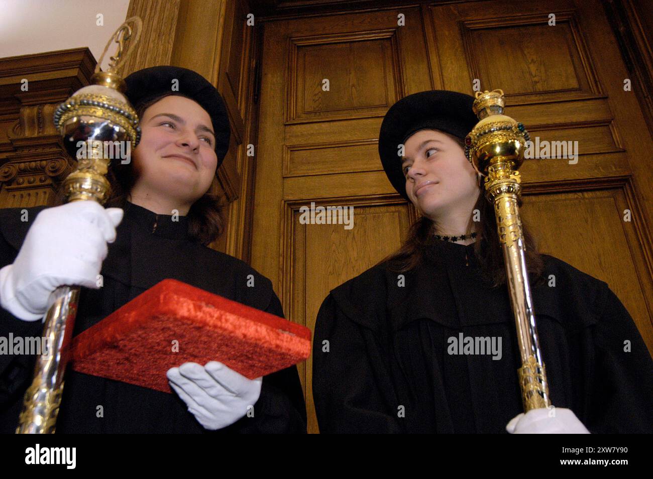 an university degree and graduation as completion of studies at the ...