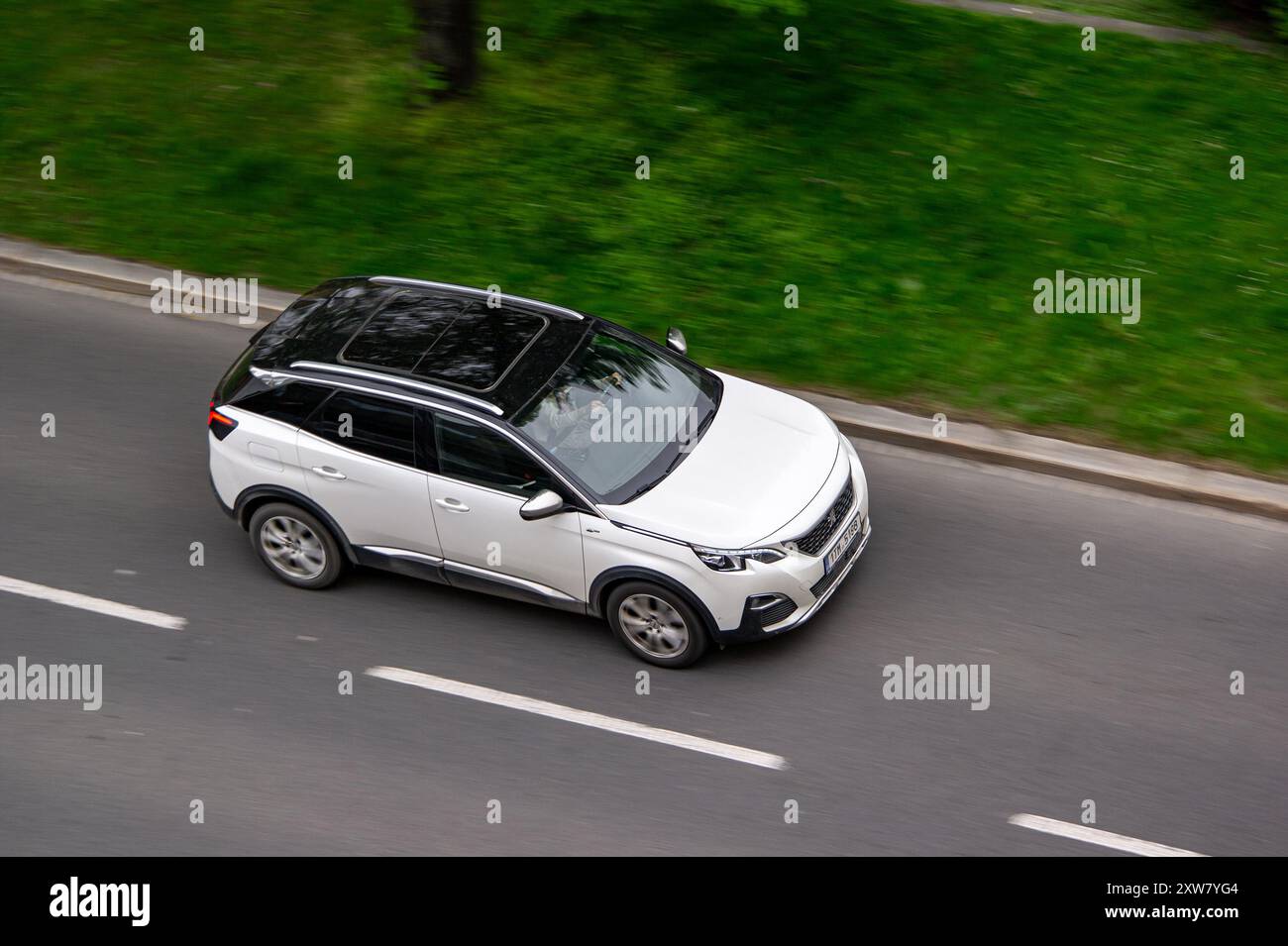 OSTRAVA, CZECH REPUBLIC - APRIL 10, 2024: White Peugeot 2008 subcompact ...