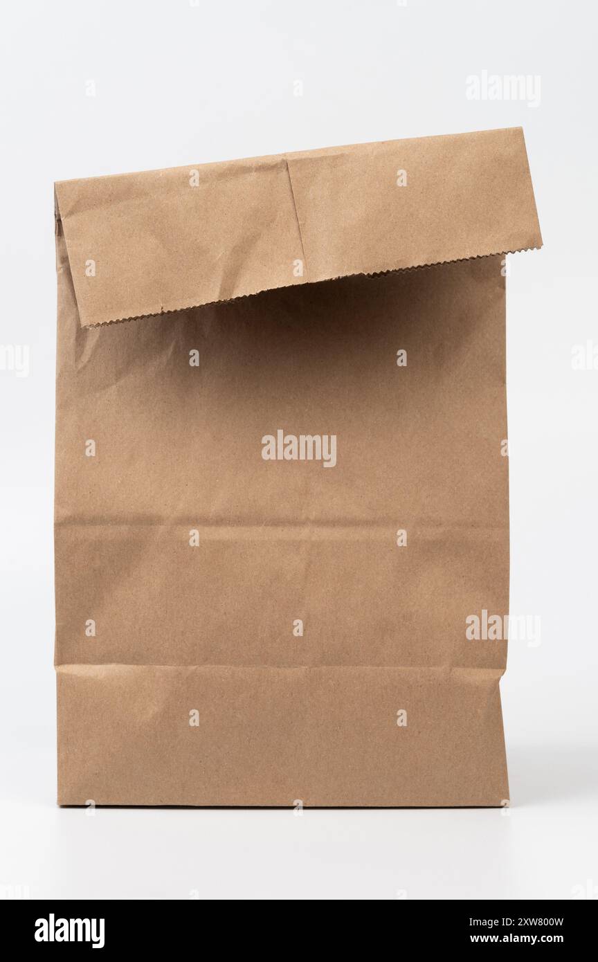 Wrinkled brown paper bag front view isolated on studio background Stock ...