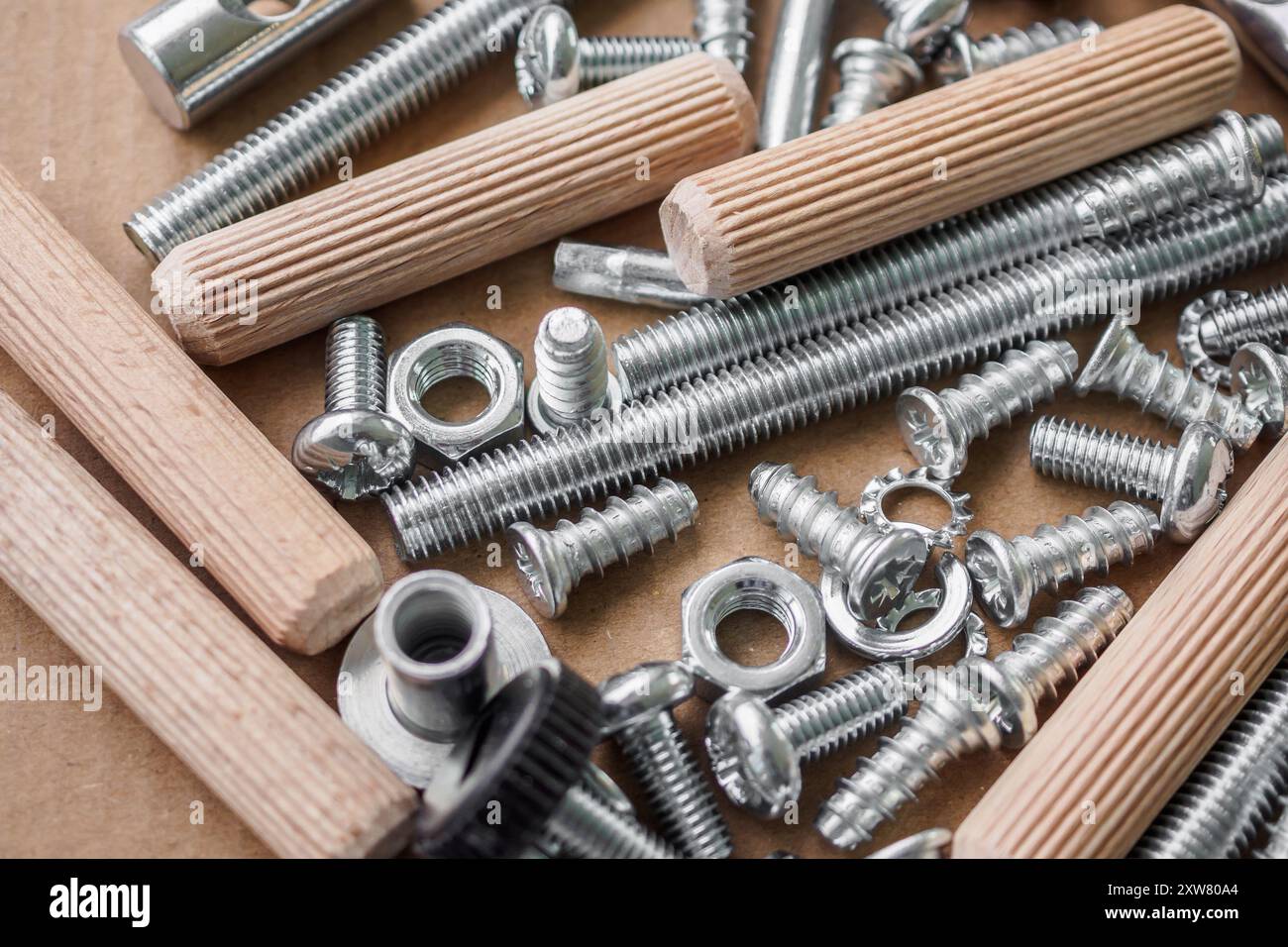 Assembly furniture tool kit with screw dowel and bolt Stock Photo - Alamy