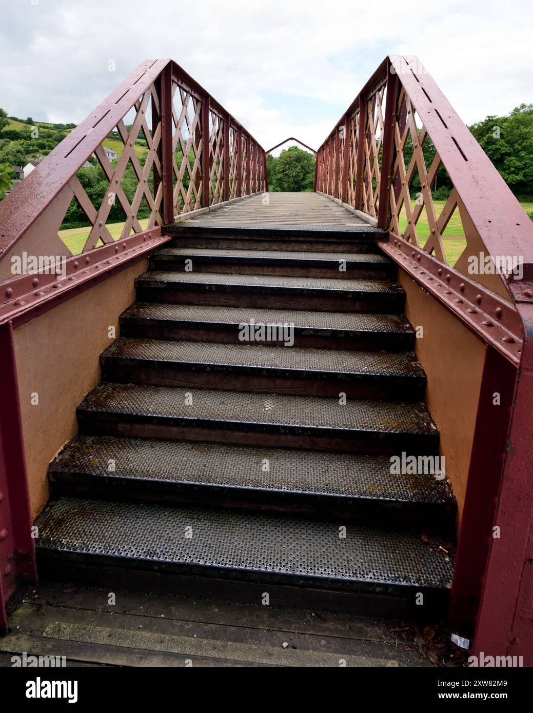 Steps on the footbridge over the railway line at Buckfastleigh station ...