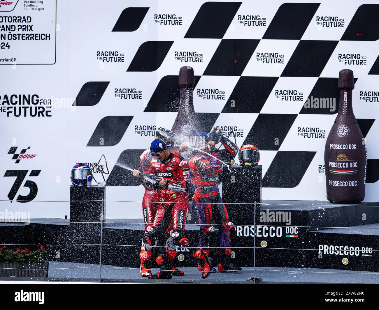 The three riders on the podium celebretes the Race of MotoGP Motorrad ...