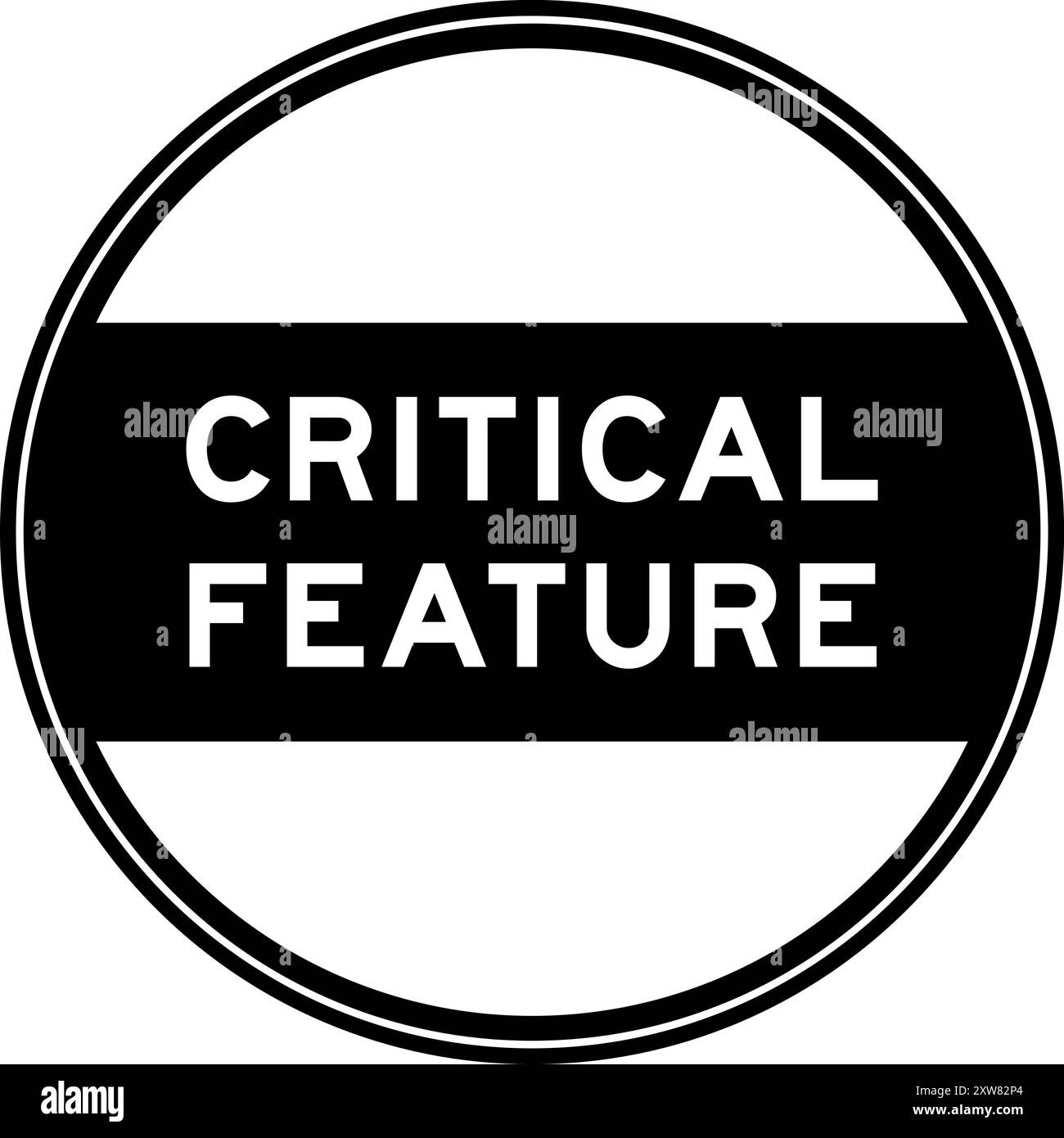 Black color round seal sticker in word critical feature on white ...