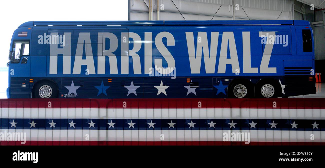 One of the two buses stand ready for the arrival of Vice President ...