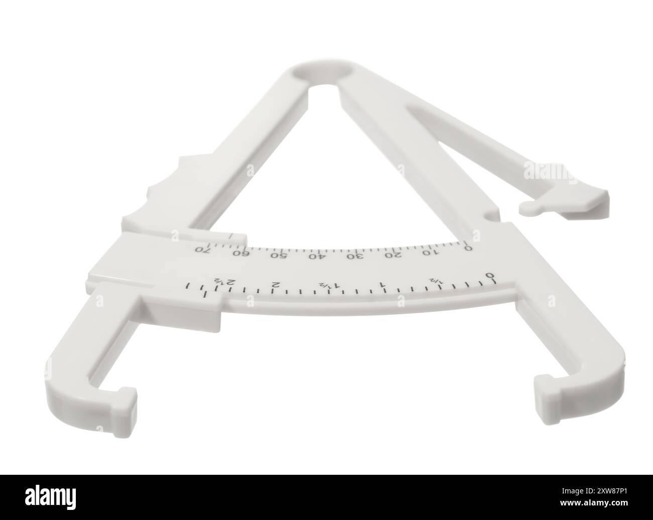 Plastic body fat caliper isolated on white Stock Photo - Alamy