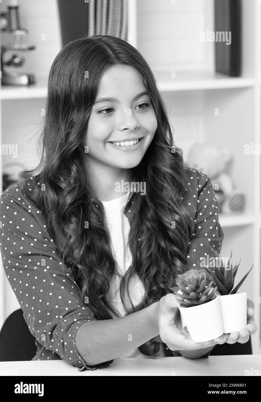 School girls in studying and examining plants. Science or biology ...
