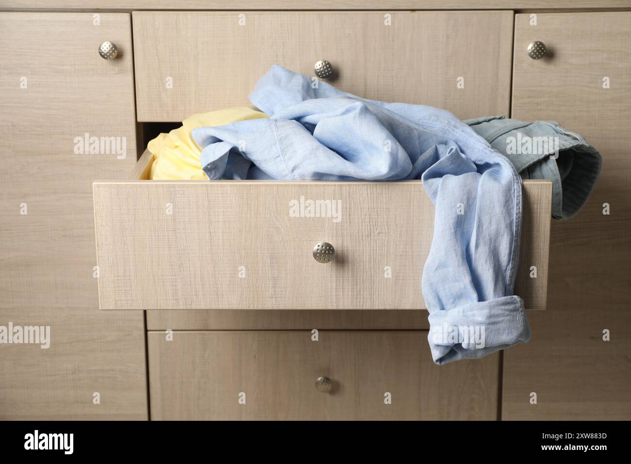 Chest of drawers clothes messy hi-res stock photography and images - Alamy