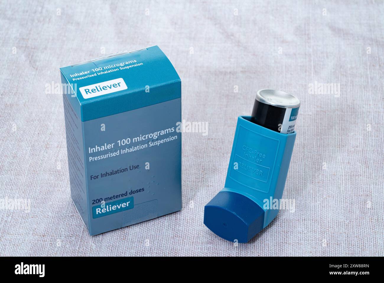 A generic box and asthma inhaler - white background Stock Photo - Alamy