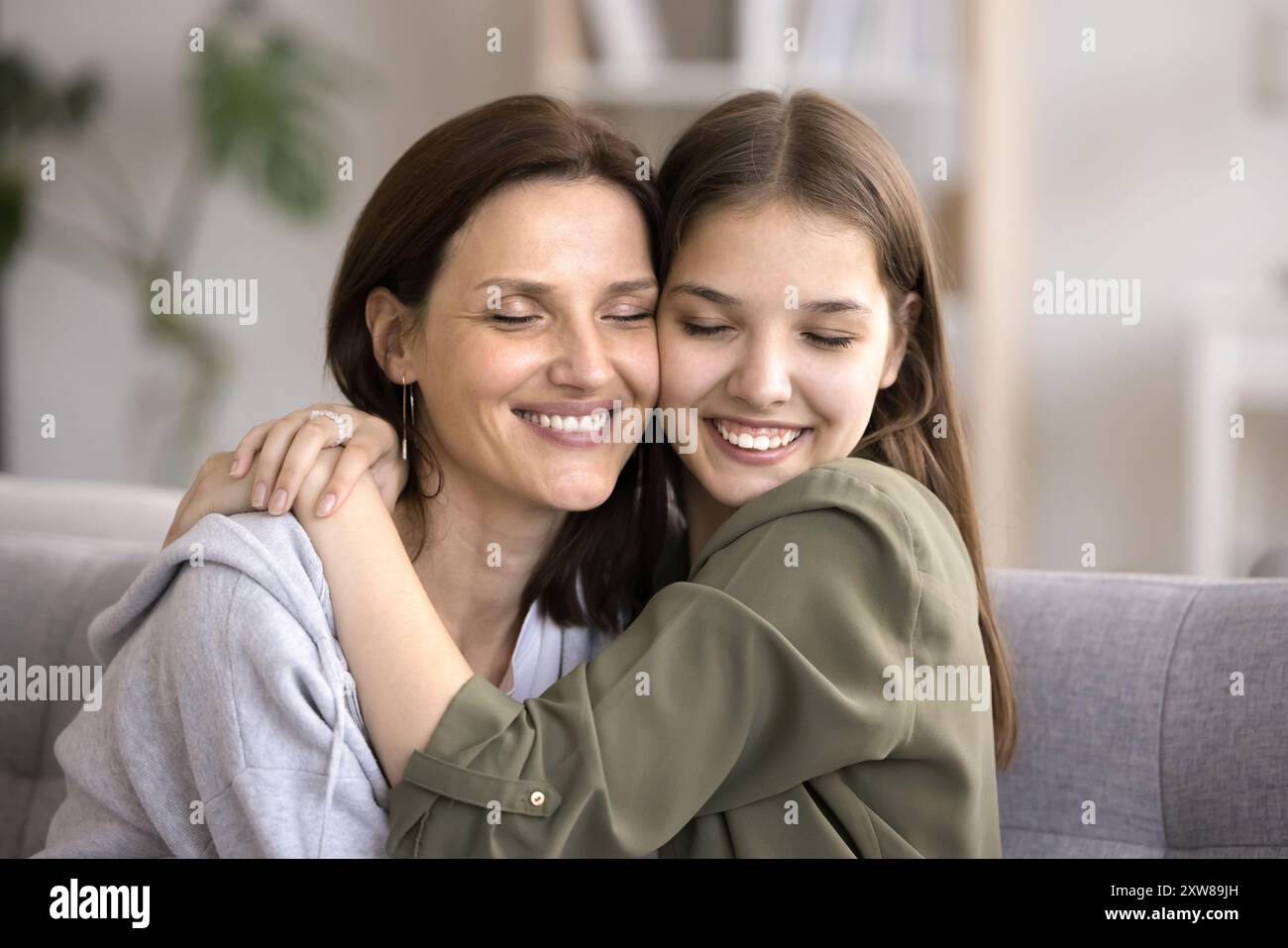 Sweet moment of tenderness between teenager daughter and mom Stock ...