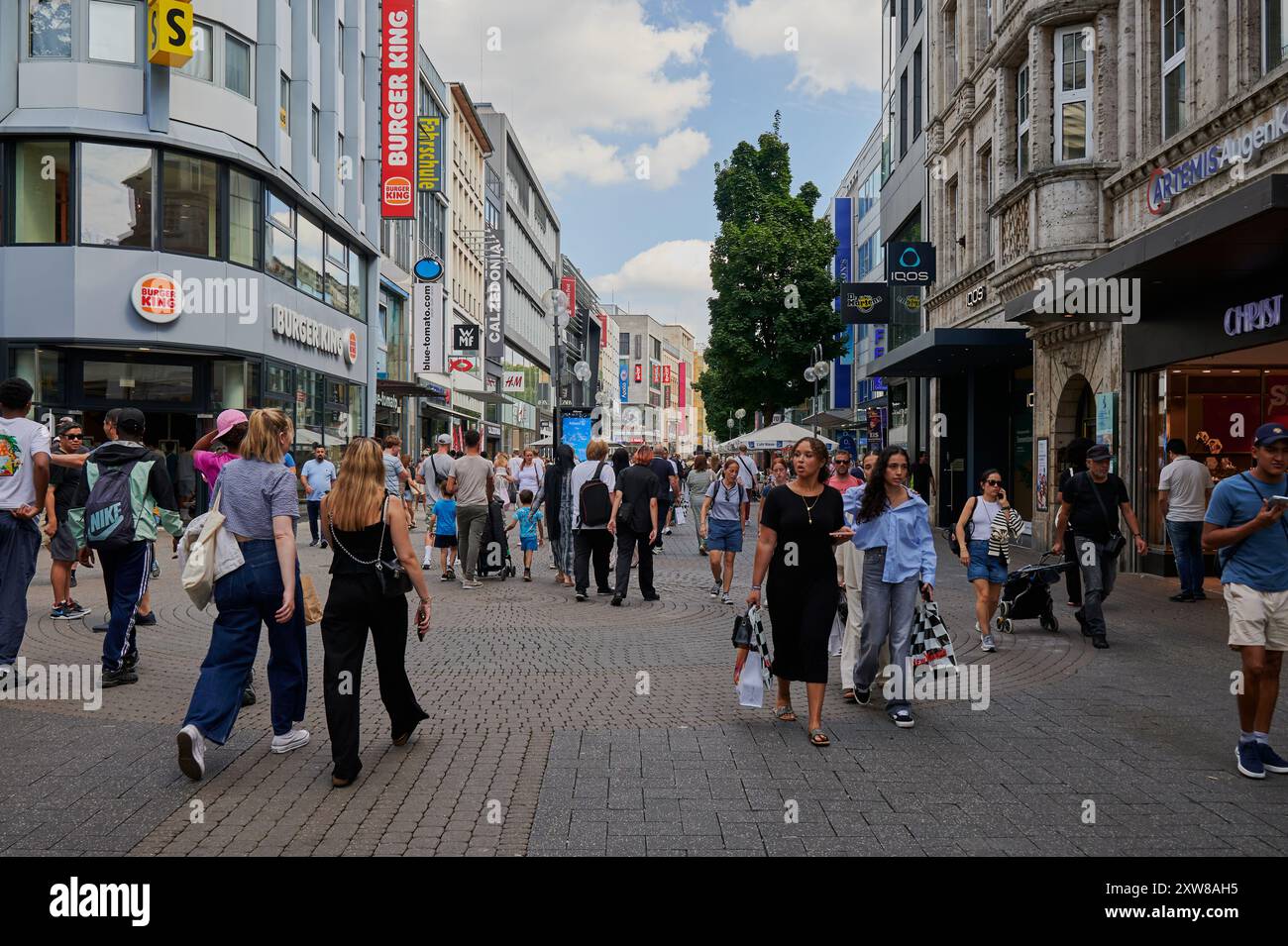 Cologne, Germany - August, 05, 2024: People shopping in the ...