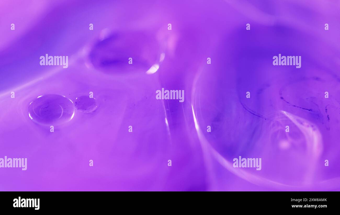 Oil bubbles. Fizzy liquid. Defocused purple blue color transparent ...