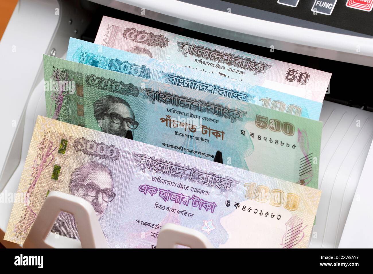 Bangladeshi money - taka in the counting machine Stock Photo - Alamy