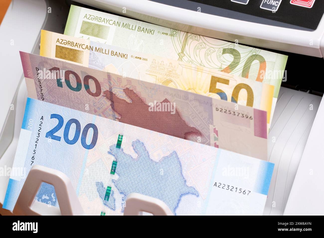 Azerbaijani money - manat in the counting machine Stock Photo - Alamy