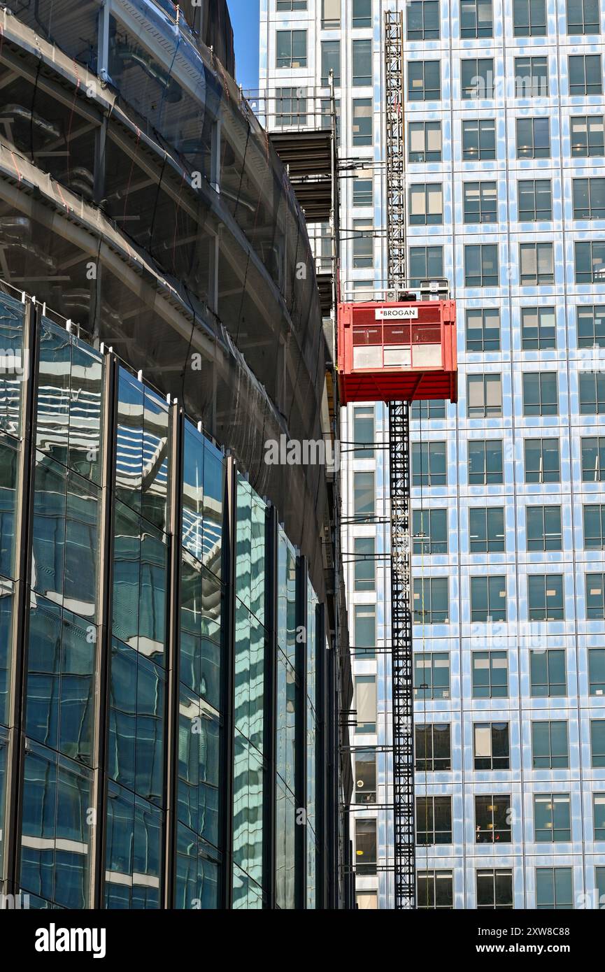 London, England, UK - 21 June 2022: Elevator for construction workers ...