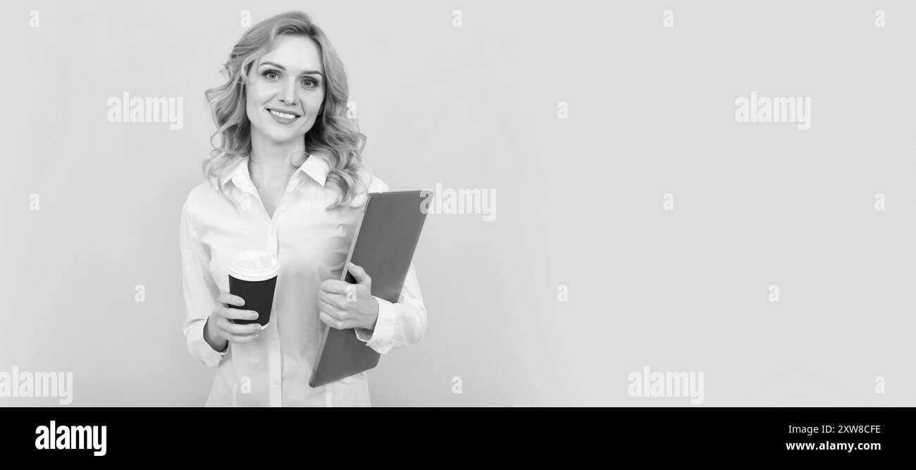 Happy girl student with laptop hold takeaway coffee drink in paper cup ...
