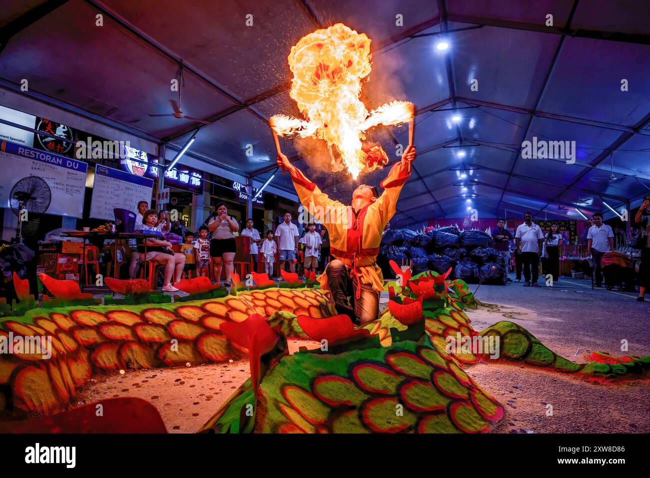 Kuala Lumpur, Malaysia. 14th Aug, 2024. Ethnic Chinese priest performs ...