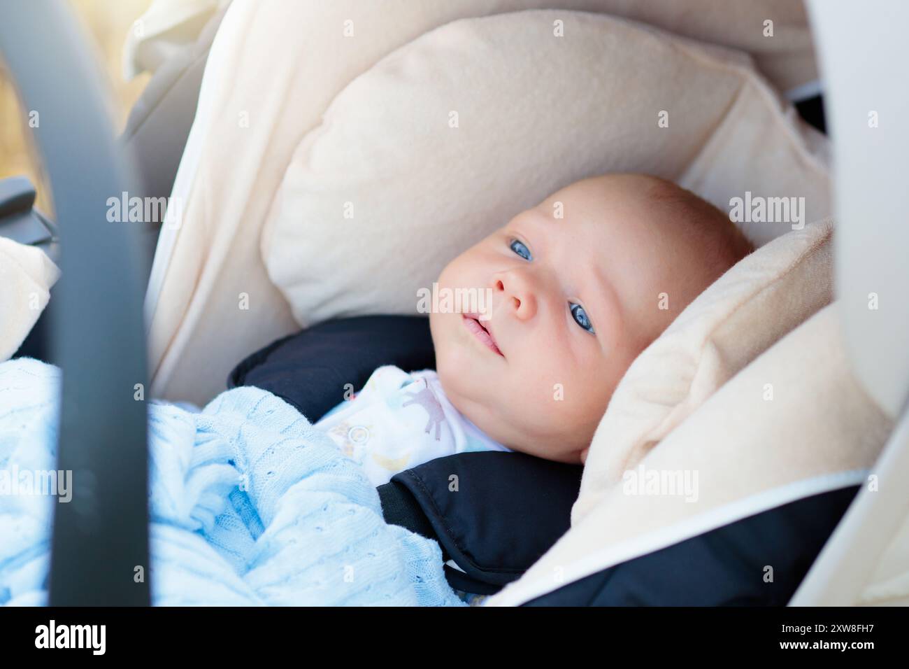 Newborn baby in car seat. Safe transportation of infant after hospital ...