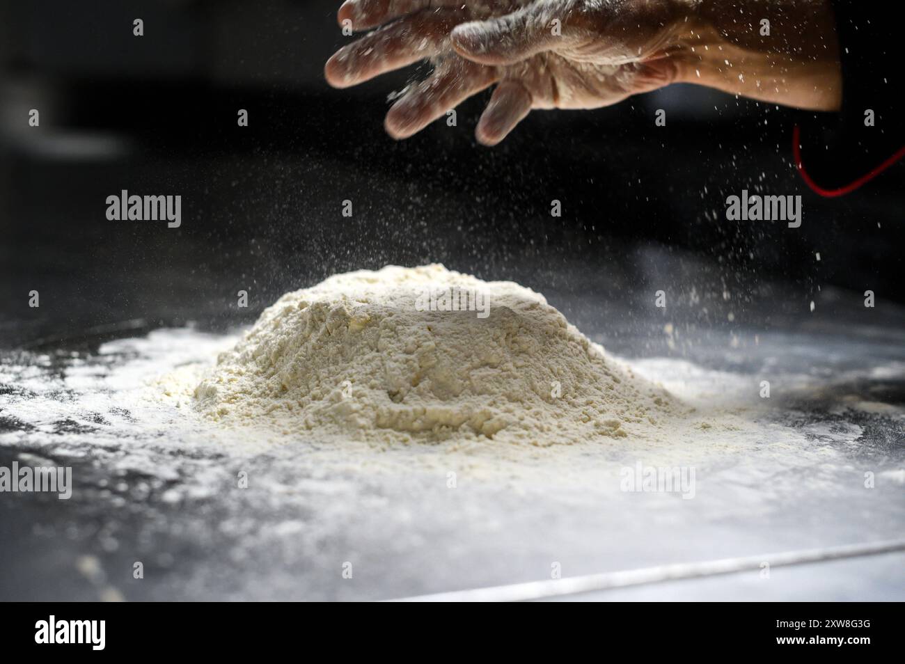 Professional chef claps hands flour hi-res stock photography and images ...