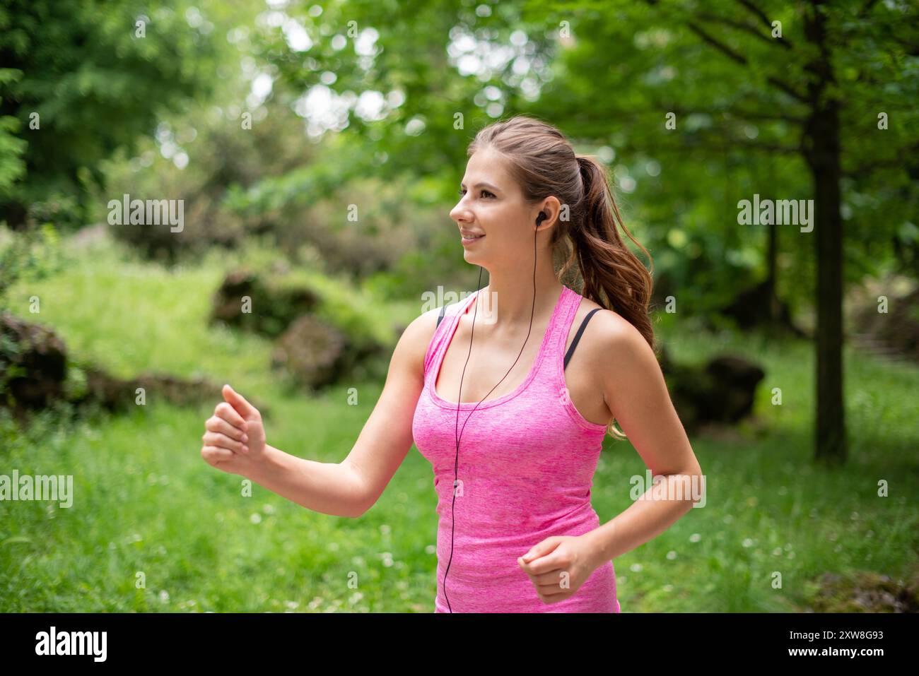Active woman running outdoor Stock Photo - Alamy