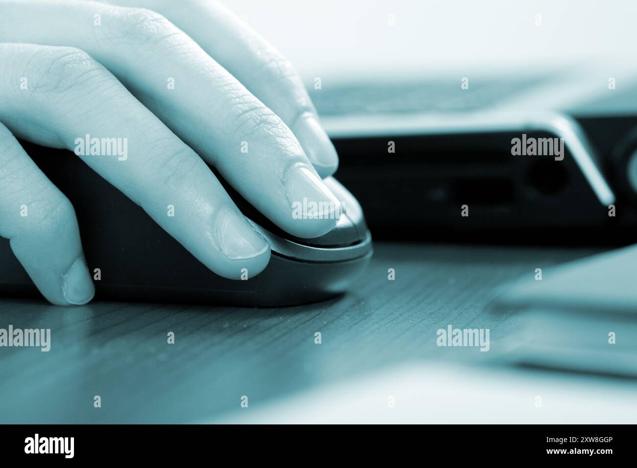 Close up of a persons hand on a computer mouse hi-res stock photography ...
