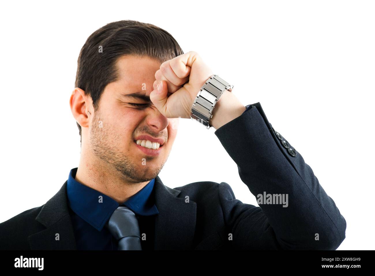 Stressed young adult businessman facing defeat and work-related stress ...