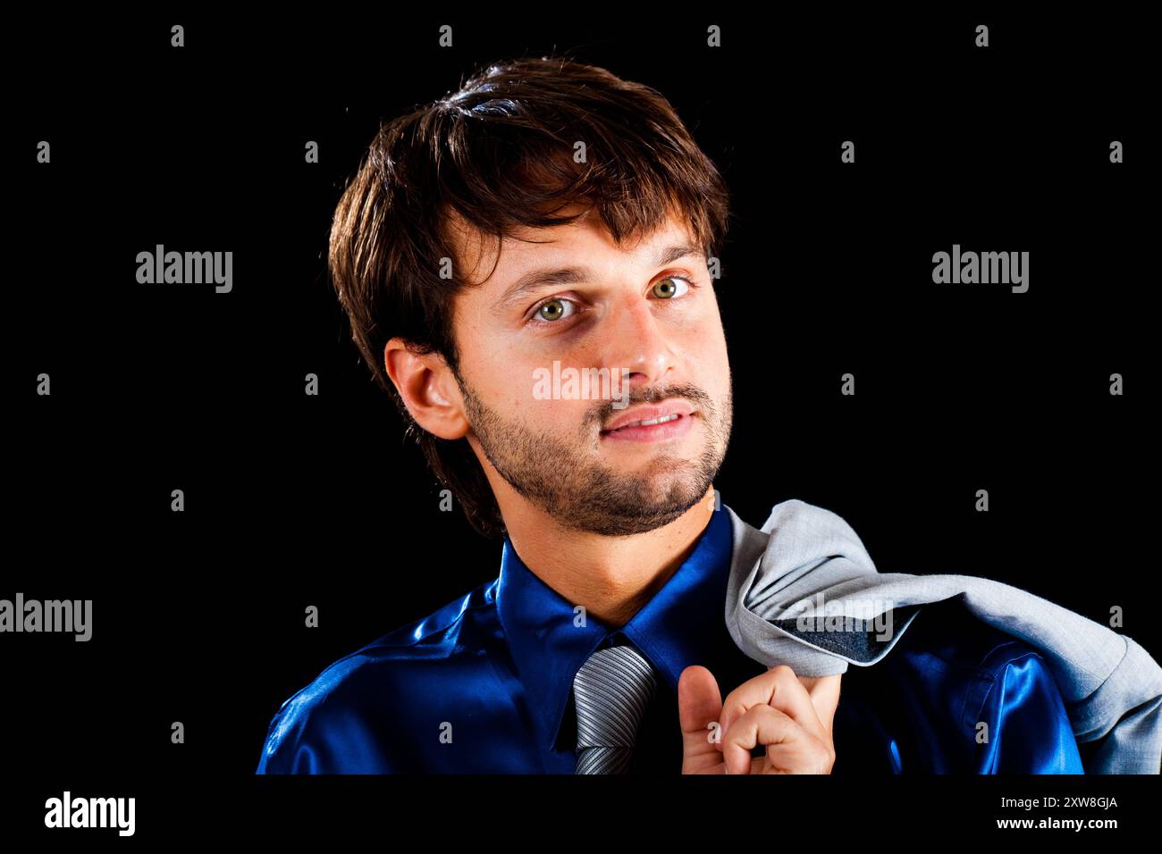 Man jacket slung over shoulder hi-res stock photography and images - Alamy