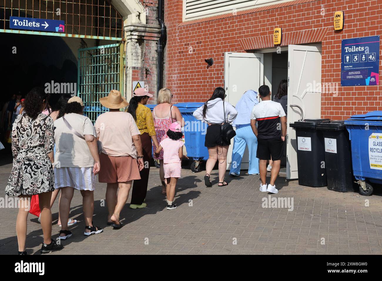 Waiting line at toilet hi-res stock photography and images - Alamy