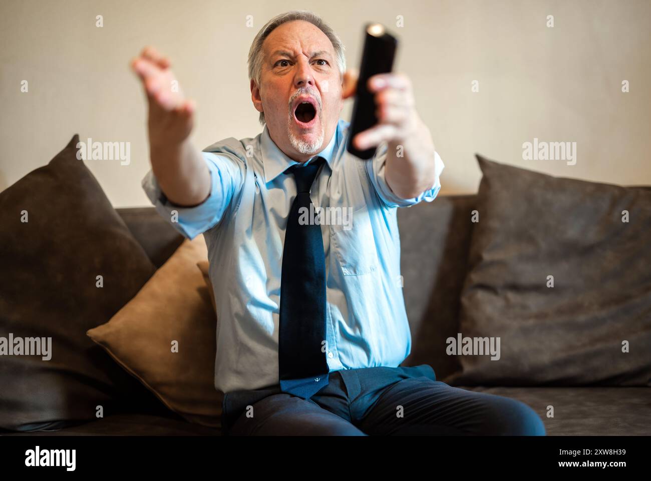 Man watching tv sport hi-res stock photography and images - Alamy